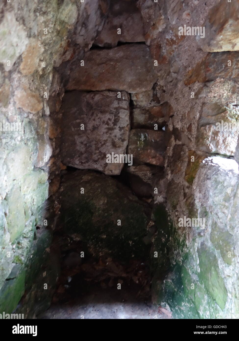 A spooky ancient cave / priesthole Stock Photo - Alamy