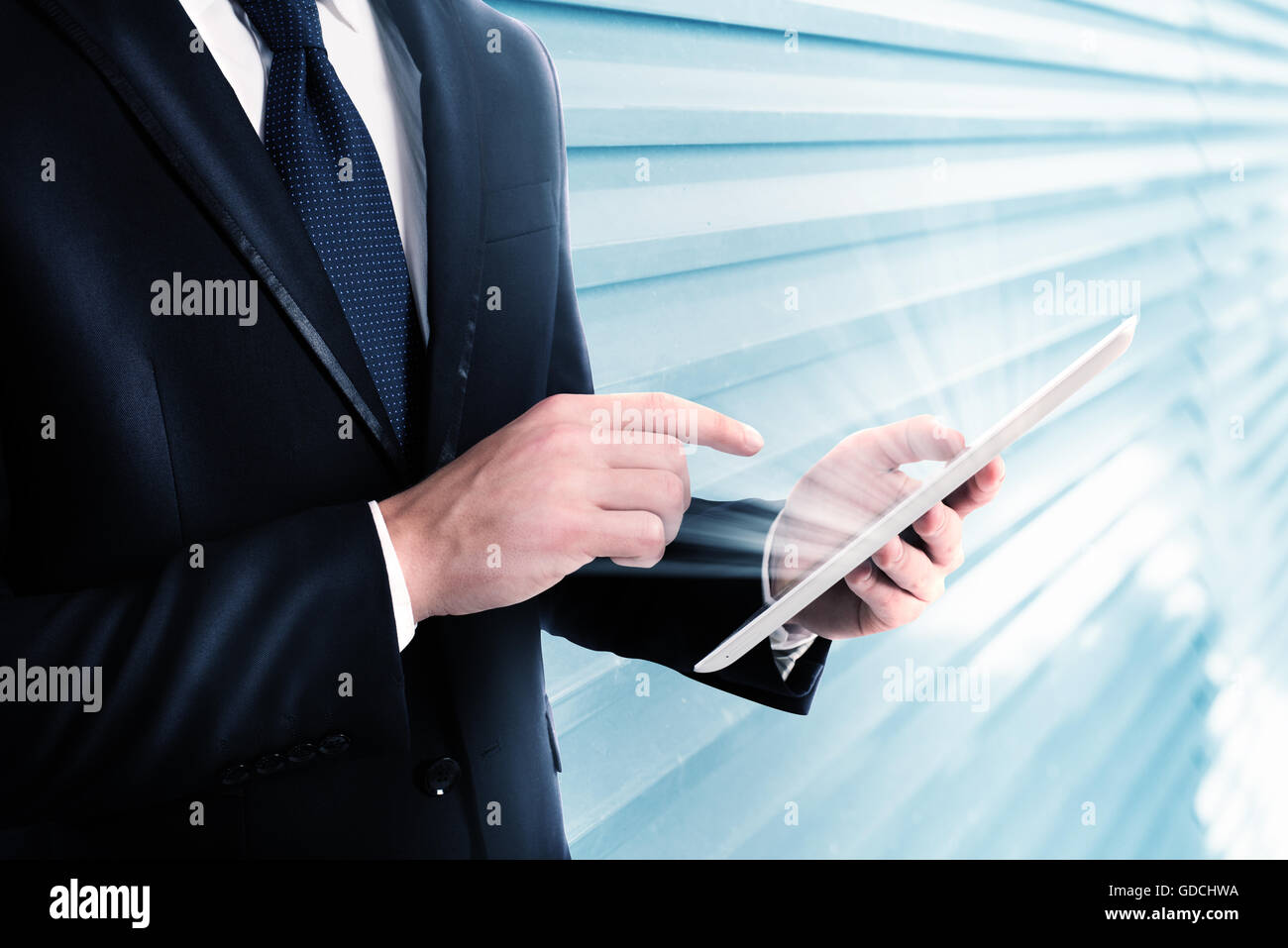 Working on tablet Stock Photo - Alamy