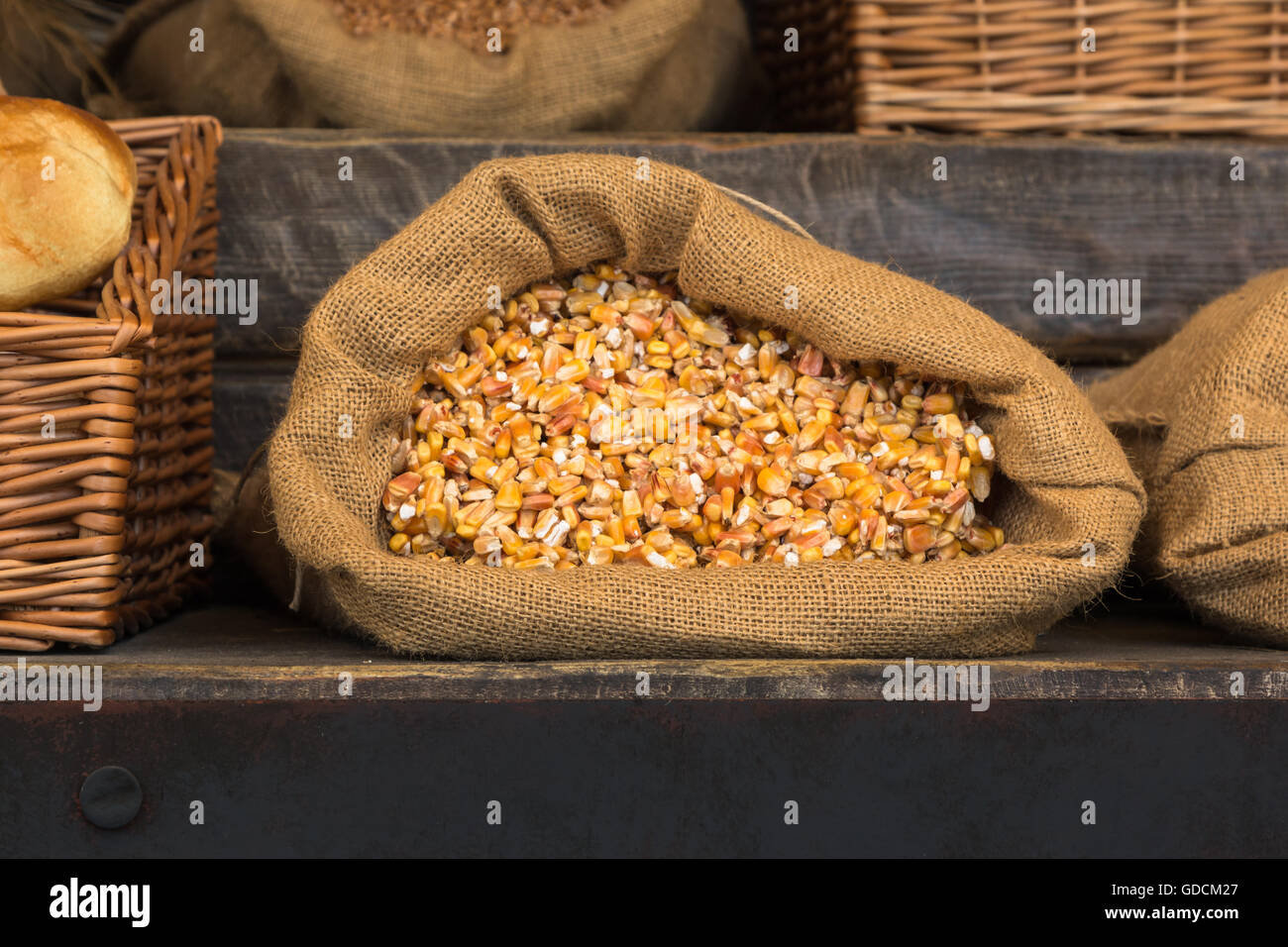 Corn Grain Inside Jute Sack Stock Photo - Alamy