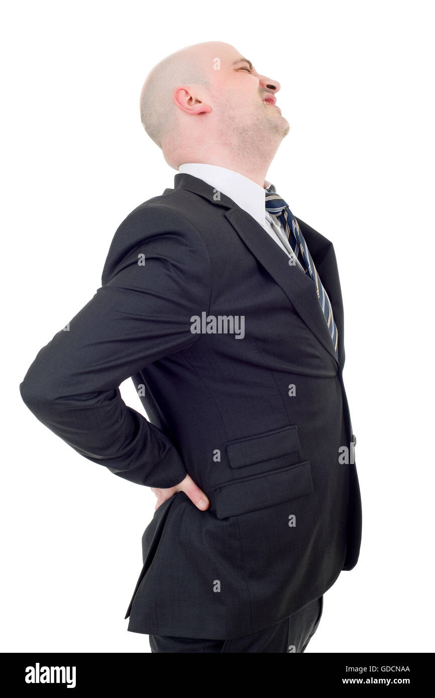Young businessman with strong back pain, isolated on white background ...