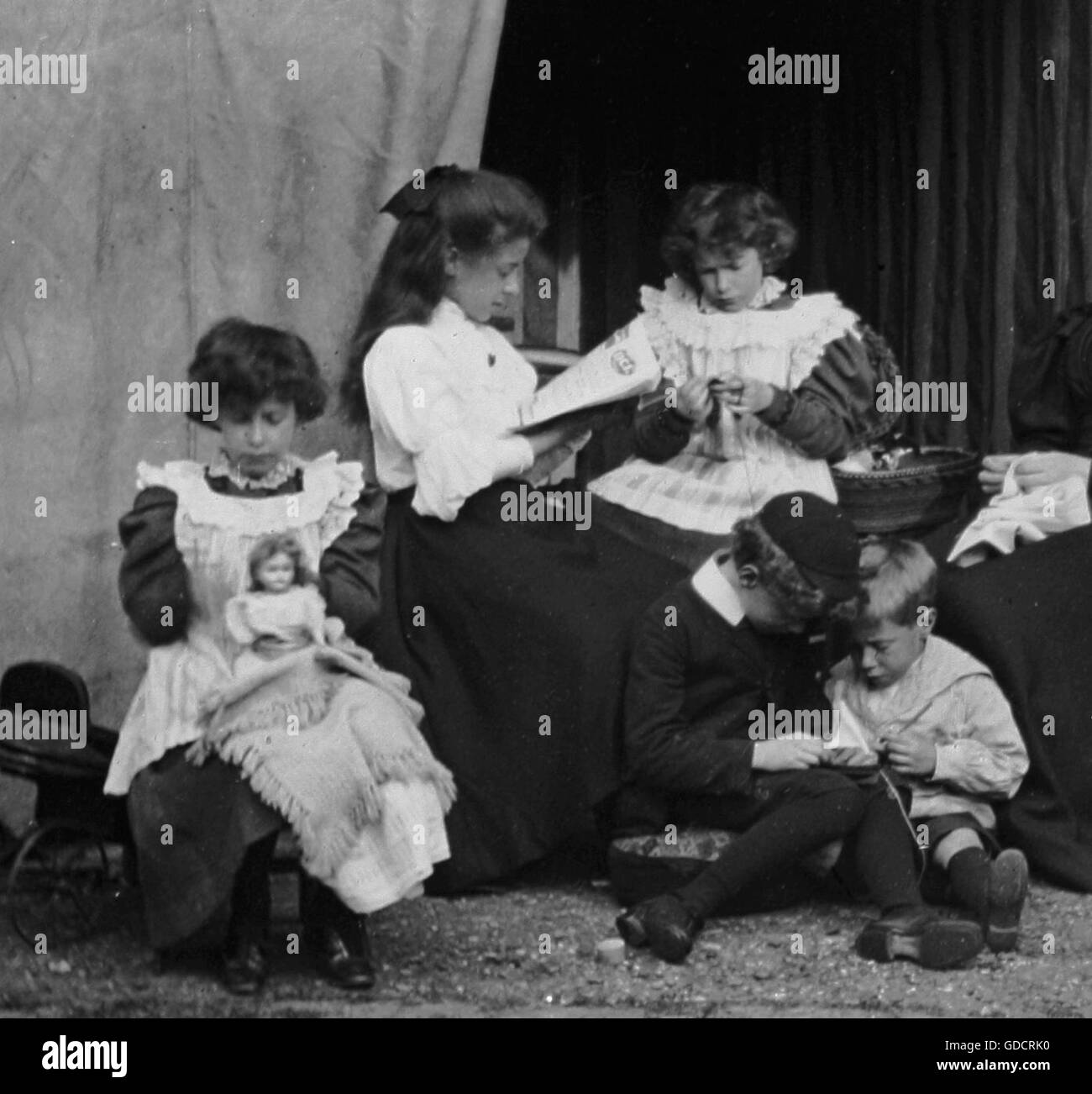 Family playing toys Black and White Stock Photos & Images - Alamy
