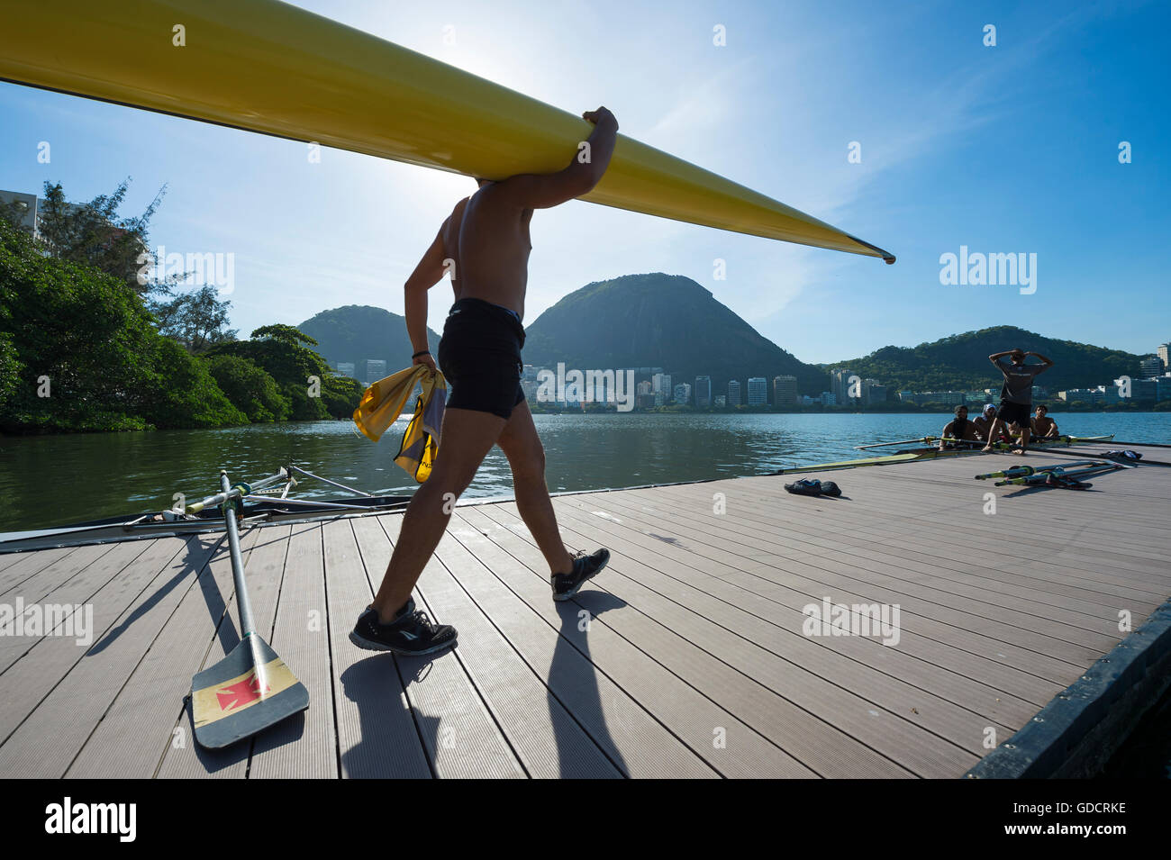 Man rowing a boat sunrise hi-res stock photography and images - Alamy