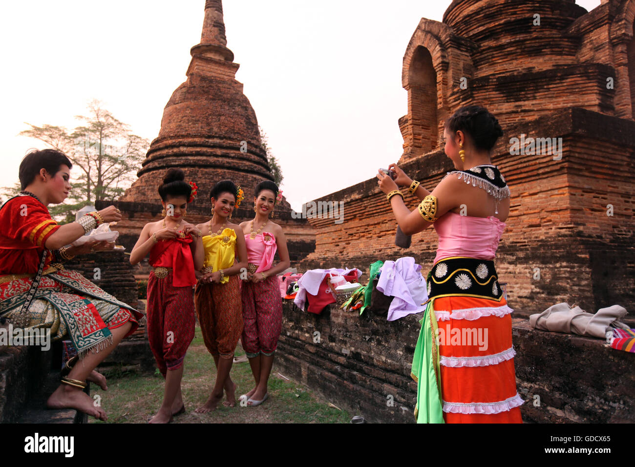 traditional thai dancers at the Wat Sa Si Temple at the Si Satchanalai ...
