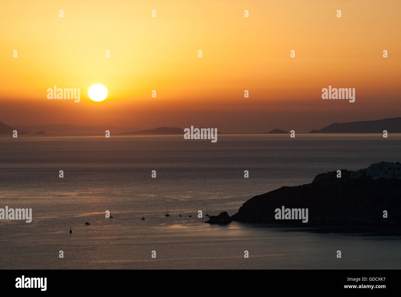 Greek sunset over Aegean, Santorini Stock Photo - Alamy