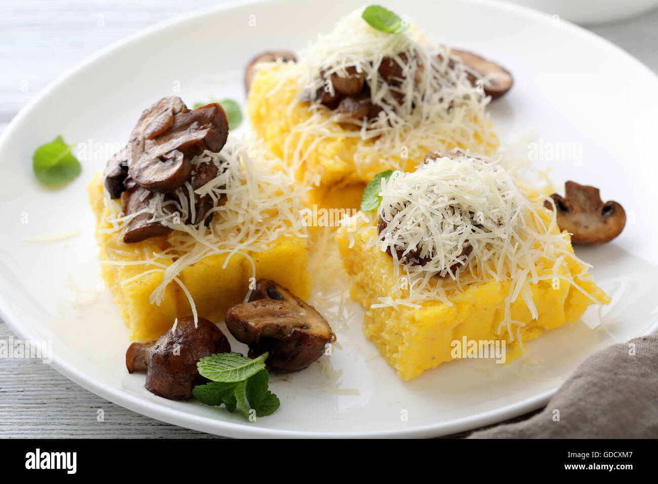 italian polenta with mushrooms, food close-up Stock Photo - Alamy