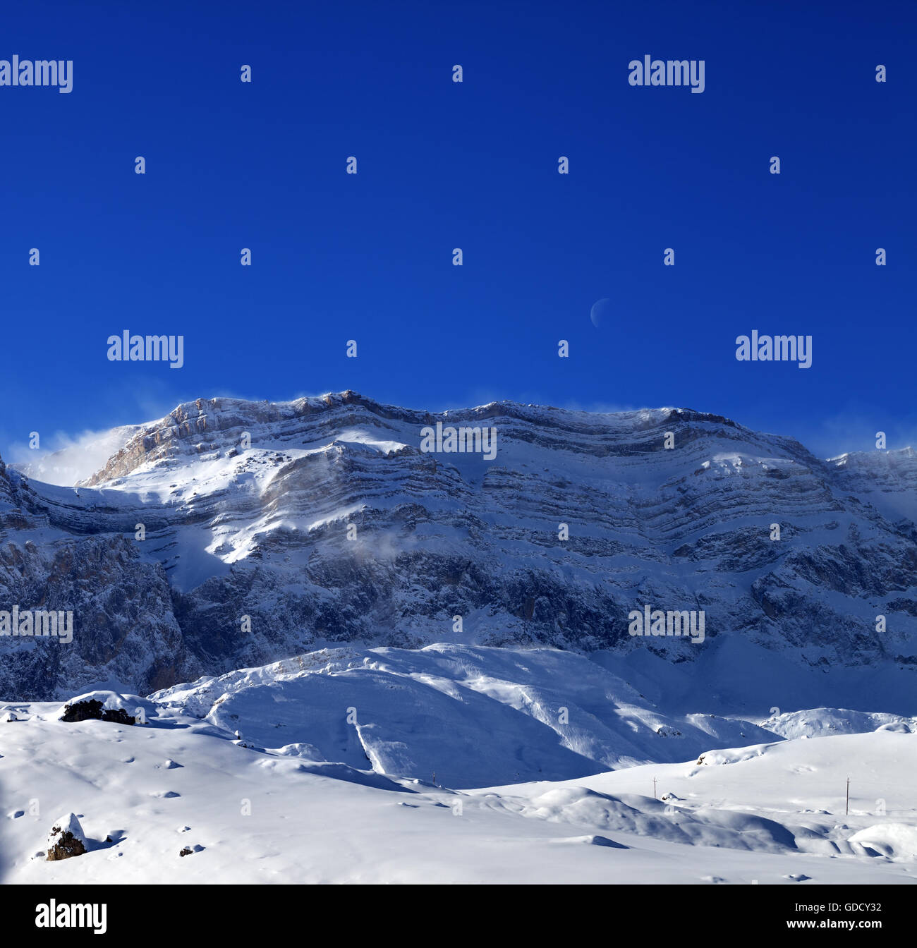 Snowy rocks at sun windy day. Greater Caucasus, Mount Shahdagh. Qusar ...