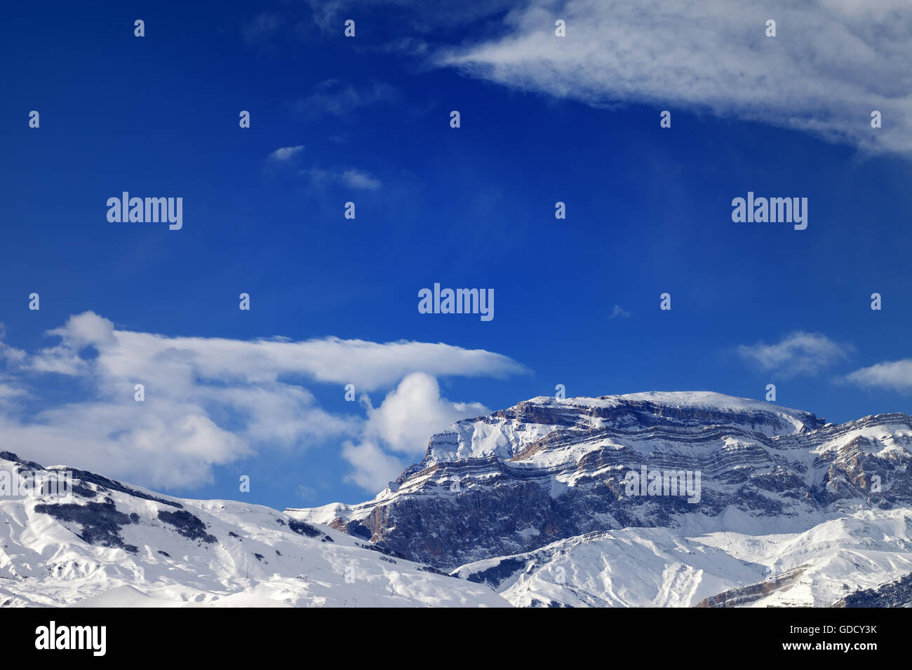 Rocks in snow at nice sun day. Greater Caucasus, Mount Shahdagh. Qusar ...