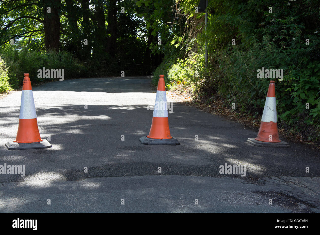 Three red traffic cones hi-res stock photography and images - Alamy