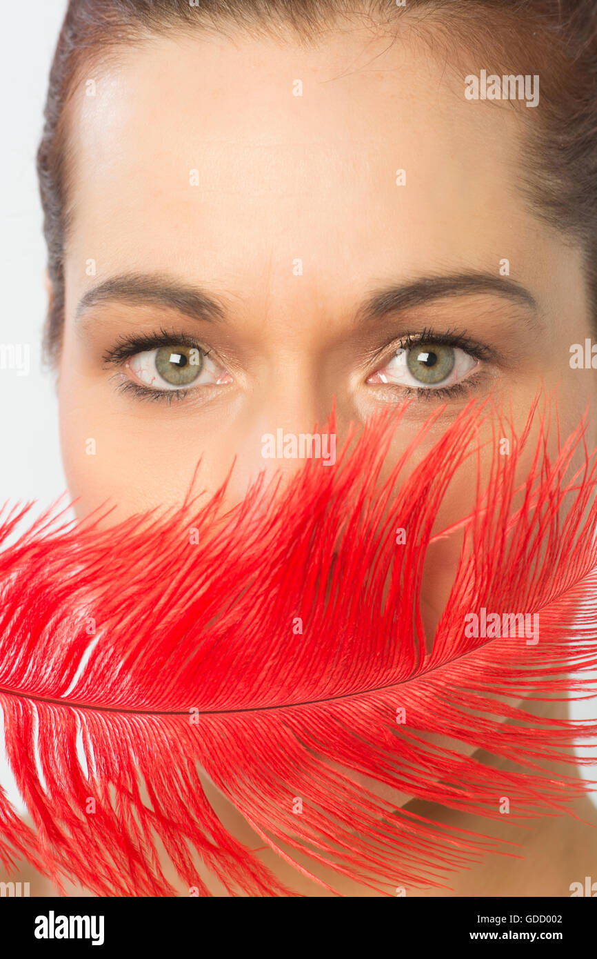 The feather a face hi-res stock photography and images - Alamy