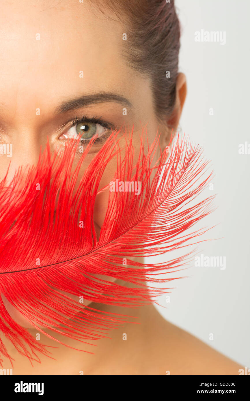Female with feather hi-res stock photography and images - Alamy