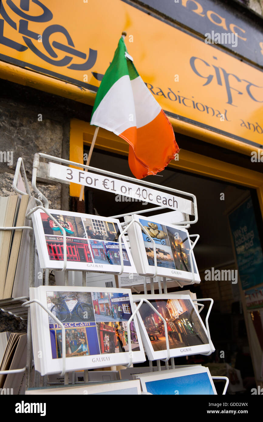 Ireland, Co Galway, Galway, Shop Street, Irish tricolour flag and ...