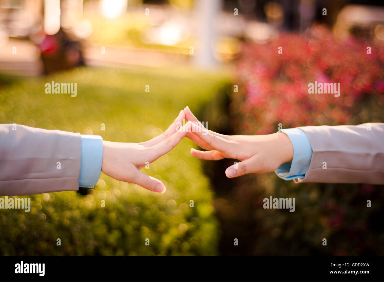 Hands reaching for each other hi-res stock photography and images - Alamy