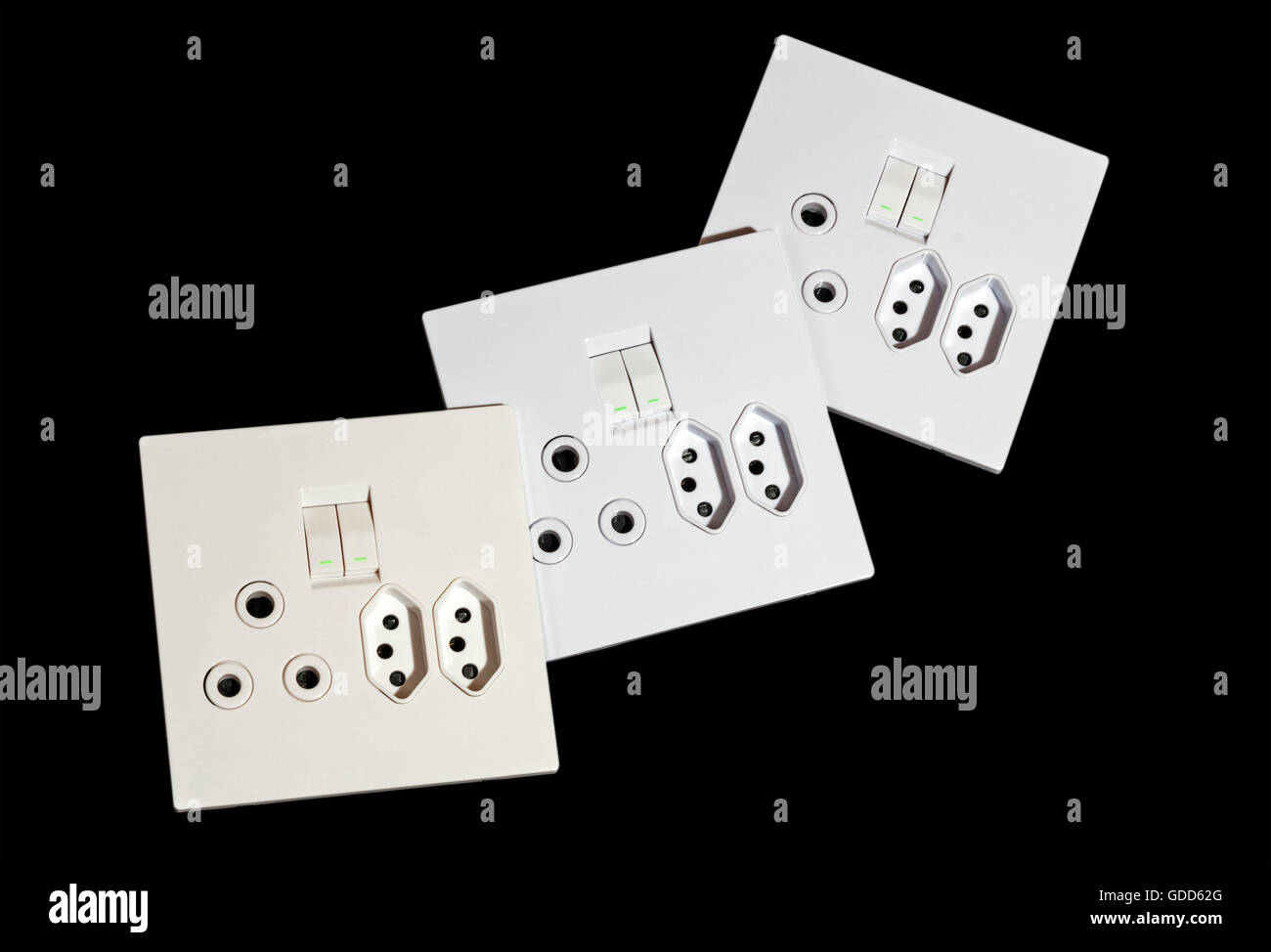 Close up of beige and white multipurpose electric wall mount sockets ...