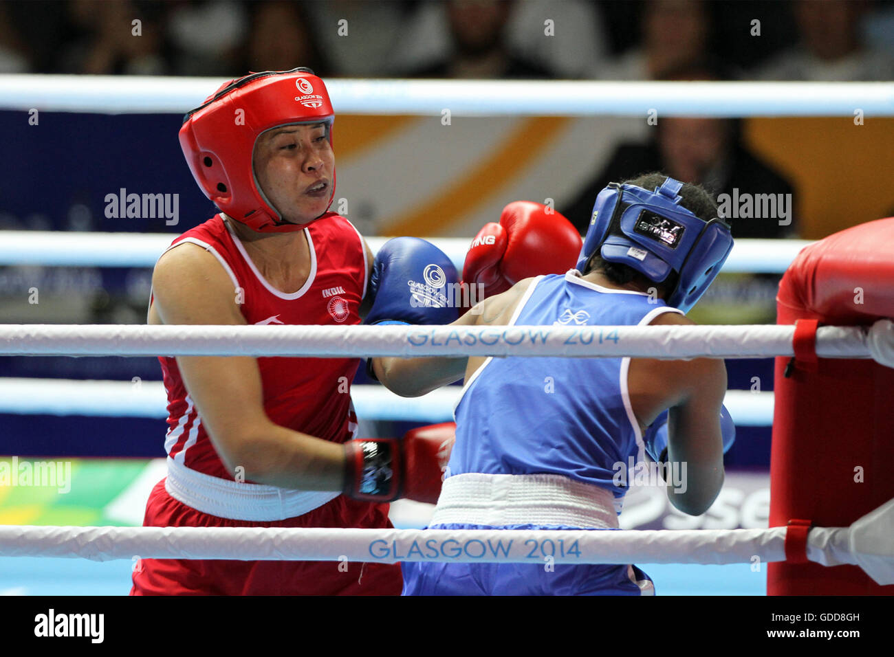 Laishram Devi of India (Red) competes against Maria Machongua of ...