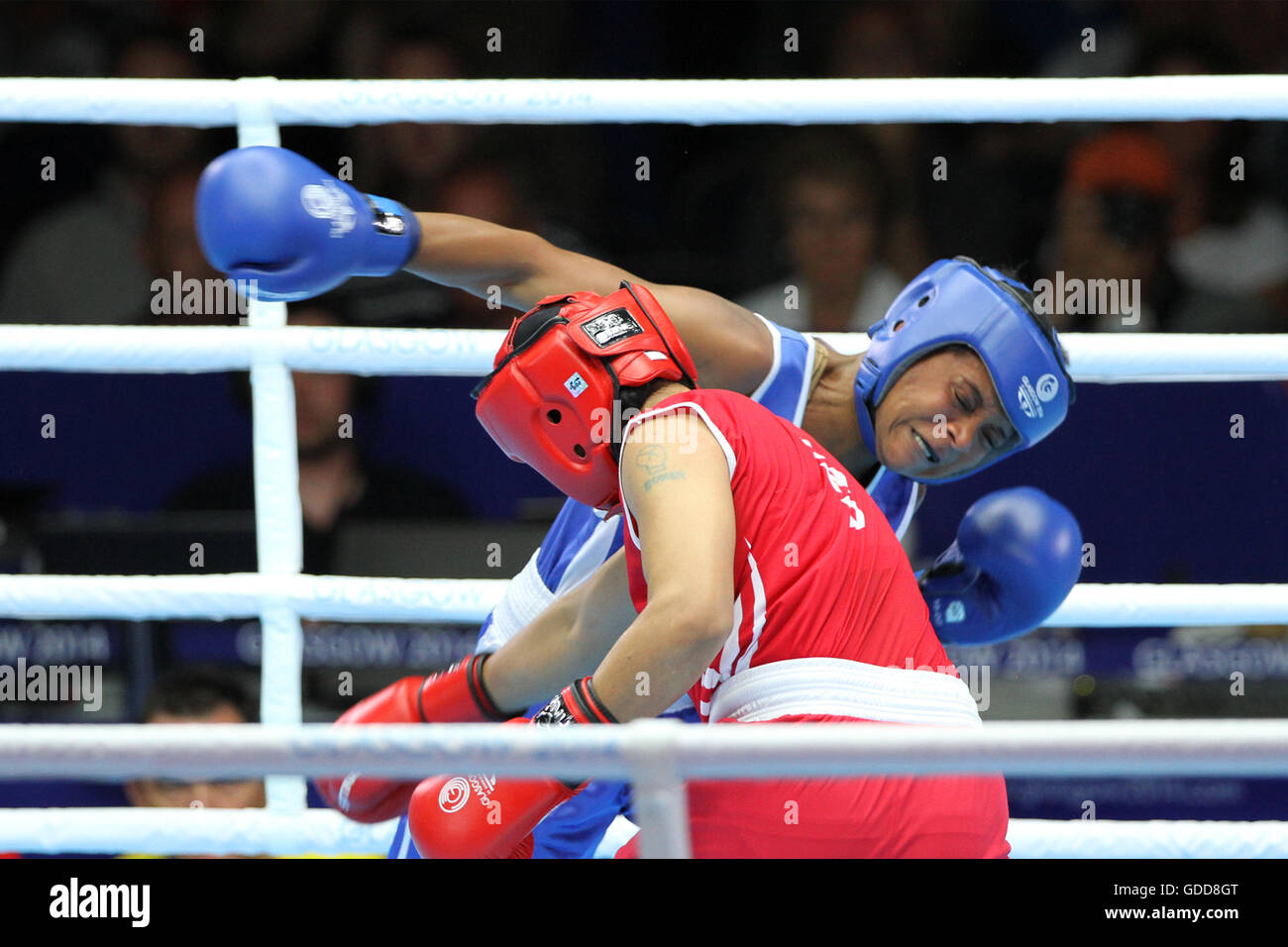 Laishram Devi of India (Red) competes against Maria Machongua of ...