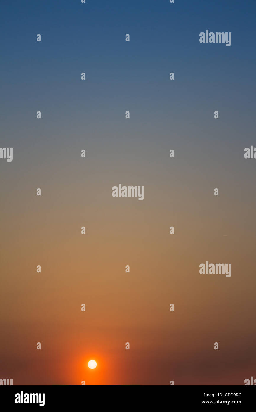 clear sunset sky colors and sun Stock Photo - Alamy