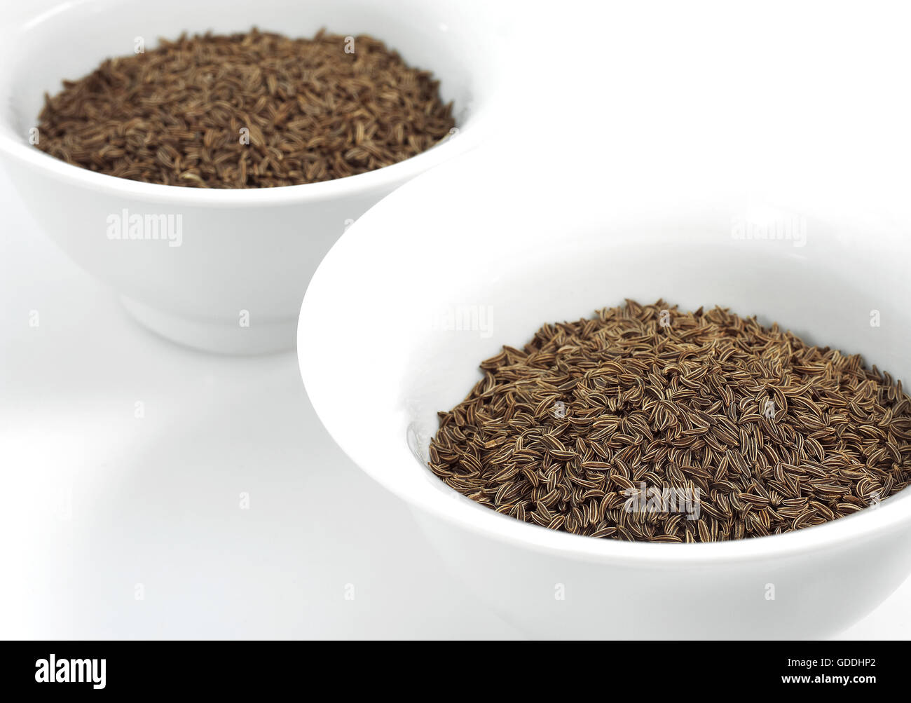 CARAWAY SEEDS carum carvi IN BOWLS Stock Photo - Alamy