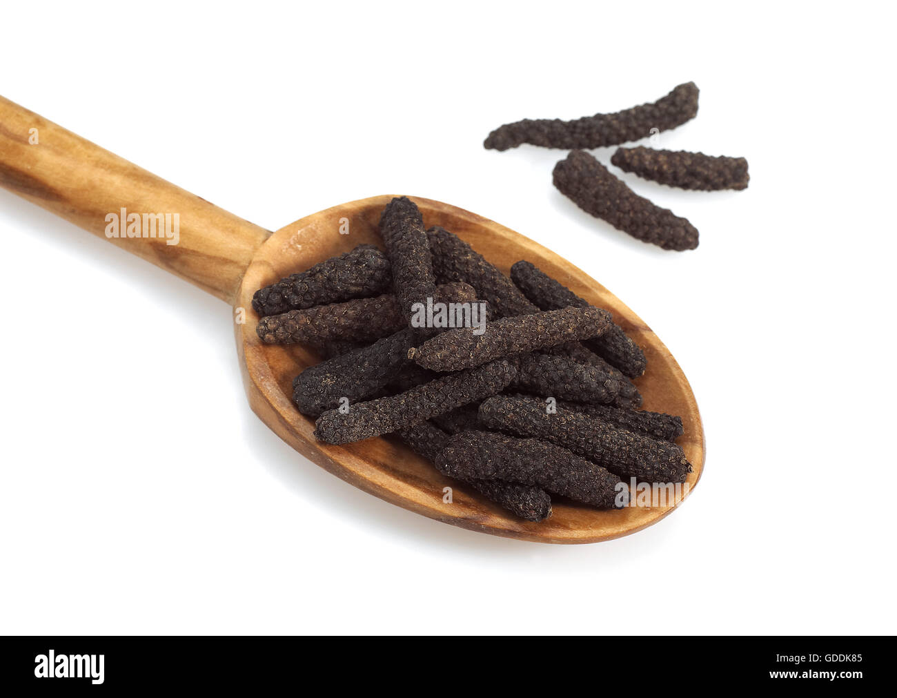 LONG PEPPER AGAINST WHITE BACKGROUND Stock Photo - Alamy