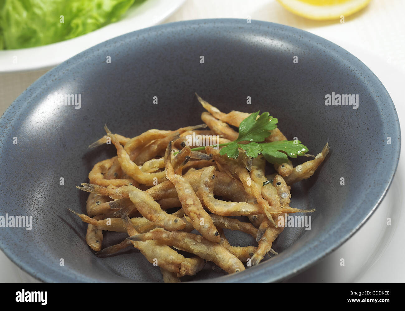 FRIED WHITEBAIT osmerus eperlanus WITH PARSLEY Stock Photo - Alamy