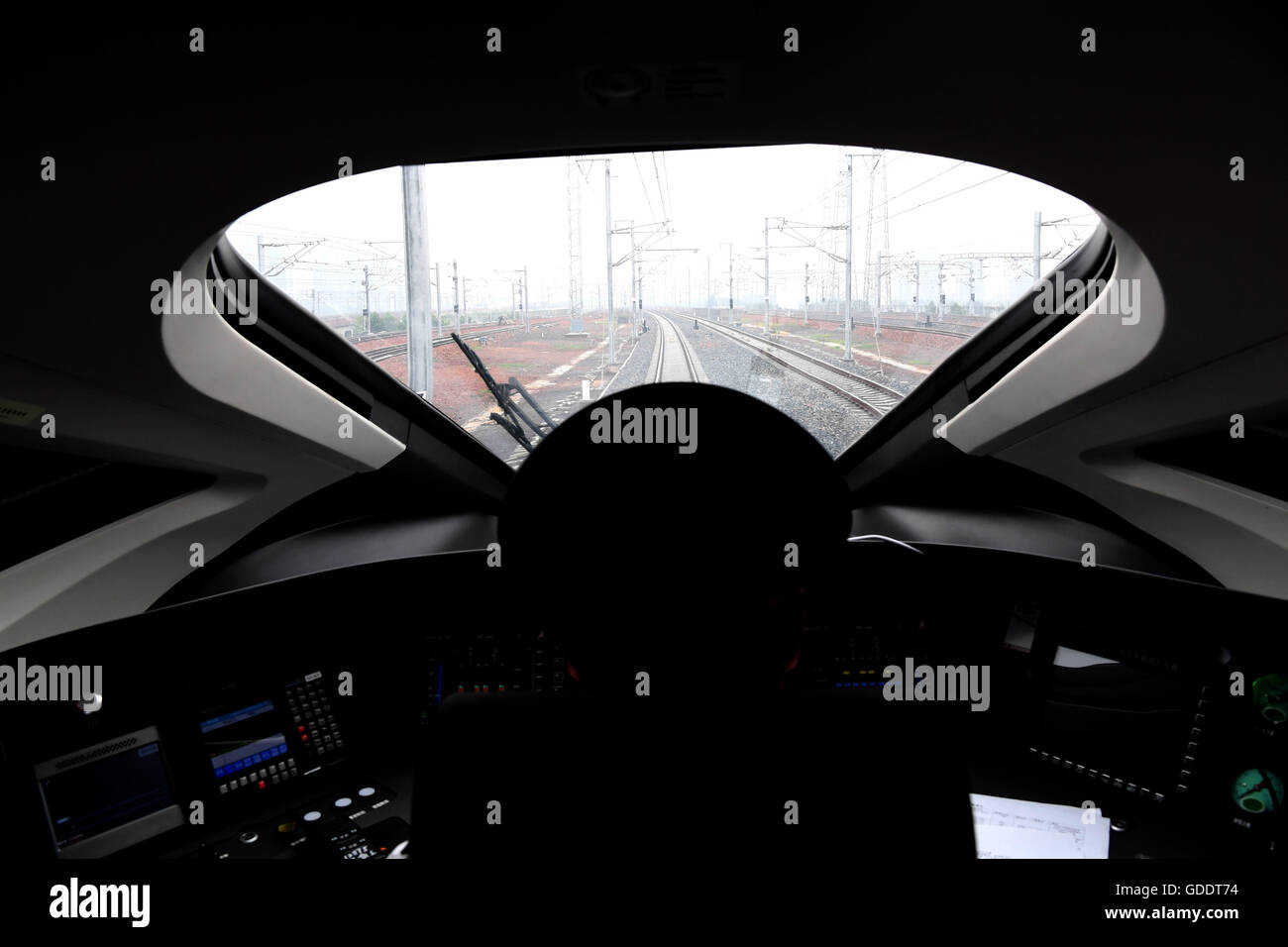 Zhengzhou. 15th July, 2016. Chinese bullet train "Dolphin Blue" runs on ...