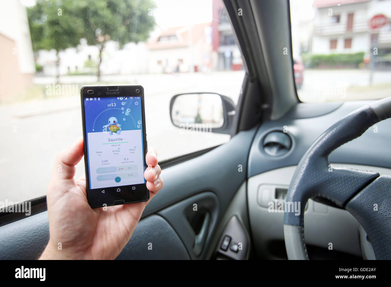 Velika Gorica, Croatia. 15th July, 2016. : A gamer using a smartphone ...