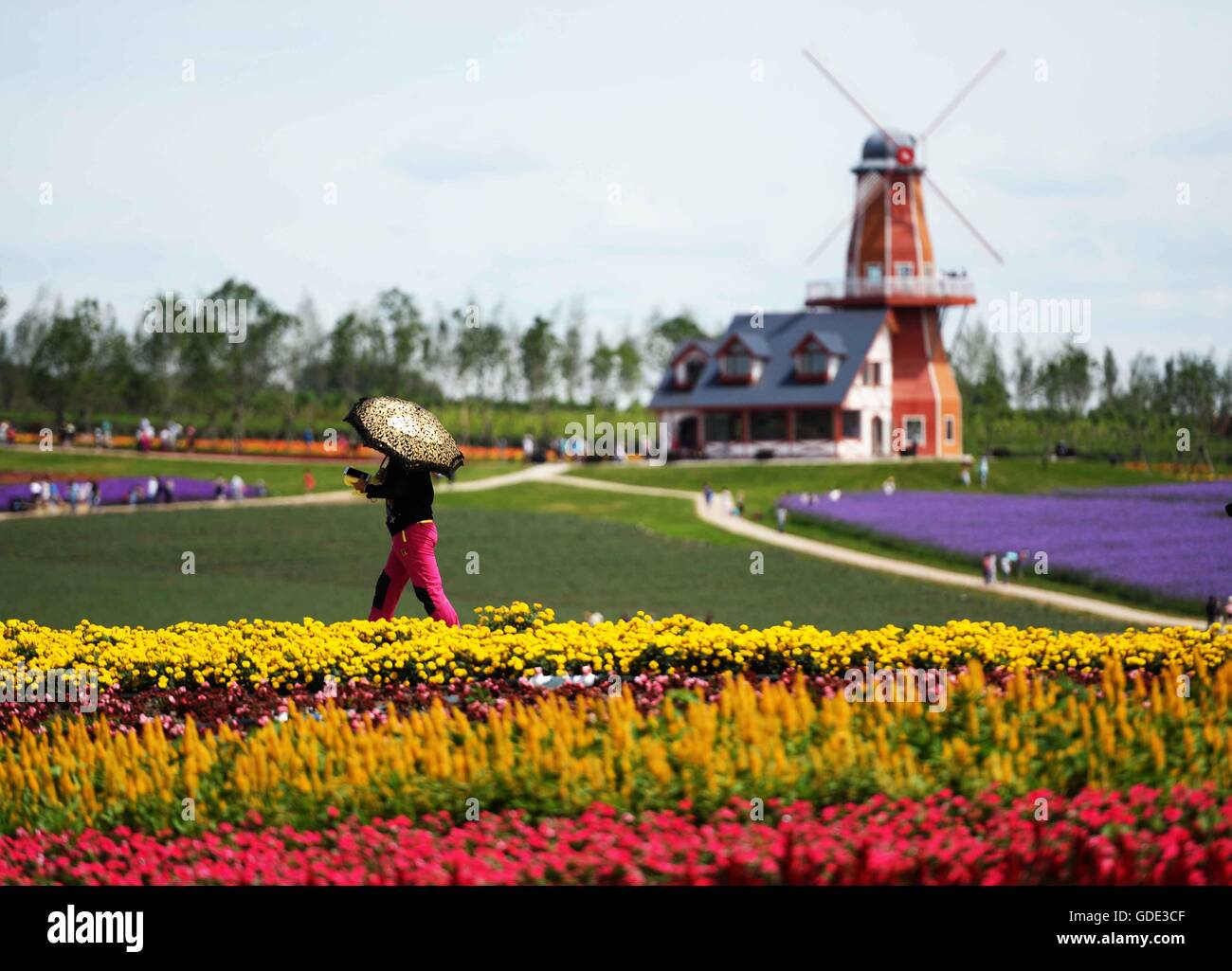 Harbin, China's Heilongjiang Province. 16th July, 2016. A visitor walks ...