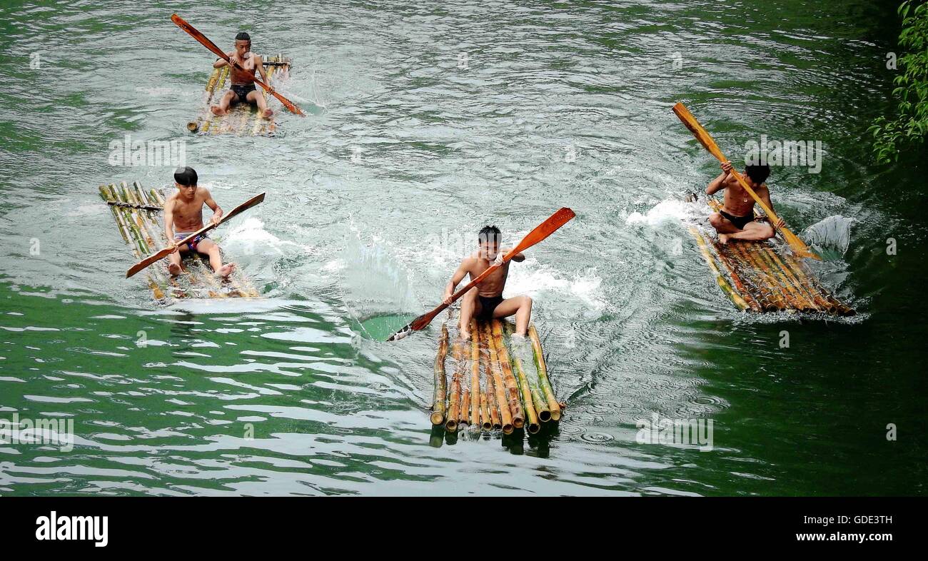 Congjiang, China's Guizhou Province. 16th July, 2016. People compete in ...