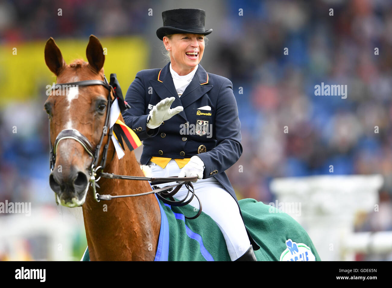 Aachen, Germany. 16th July, 2016. Isabell Werth laughs during the ...