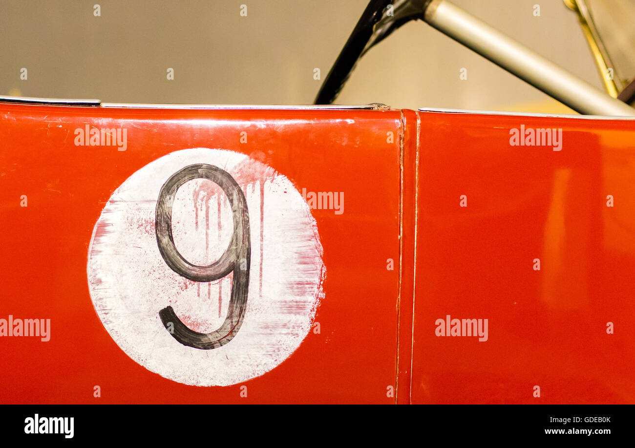 Painted number on an old car, isolated Stock Photo - Alamy