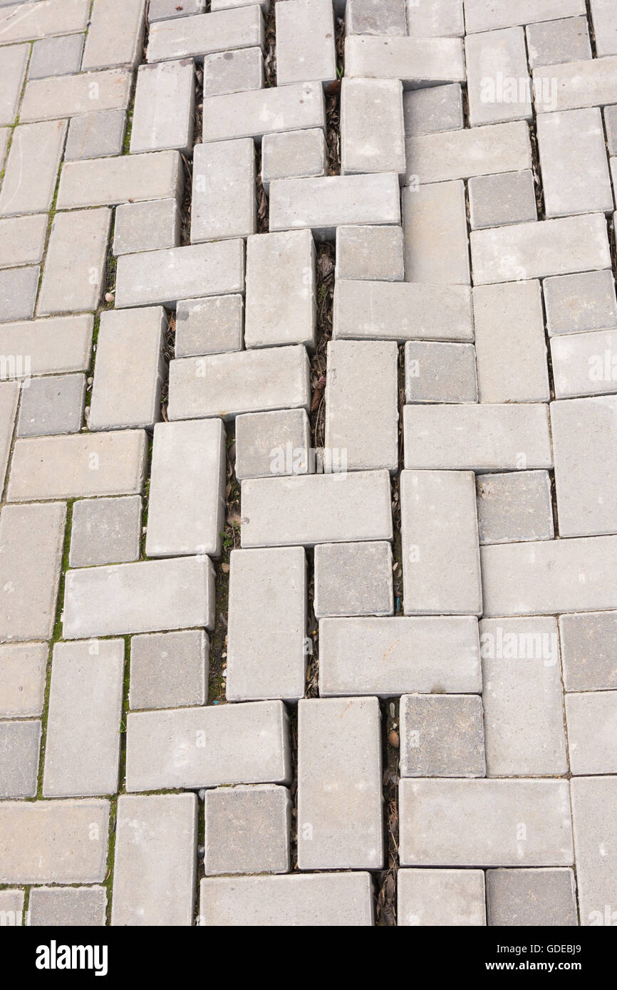 Destroyed walkway of pavers Stock Photo - Alamy