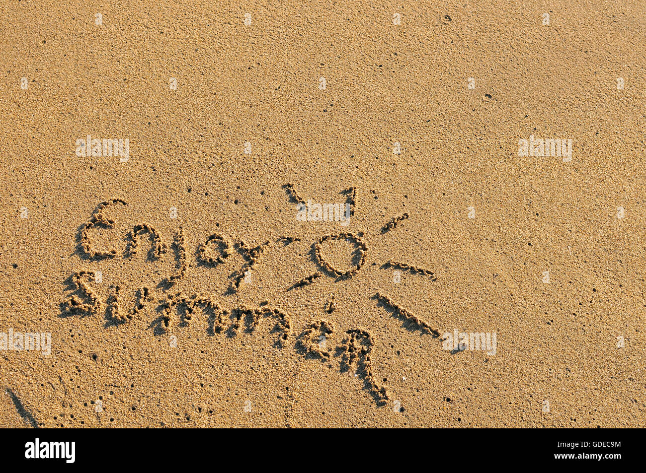 Enjoy summer sign Stock Photo - Alamy