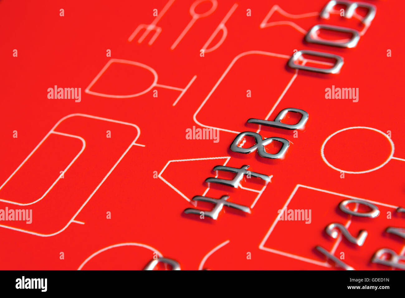 Detail of red credit card with numbers and home-related reasons ...