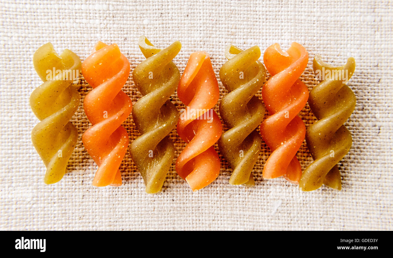 Italian raw Fusilli pasta in a sackcloth. Horizontal image Stock Photo ...