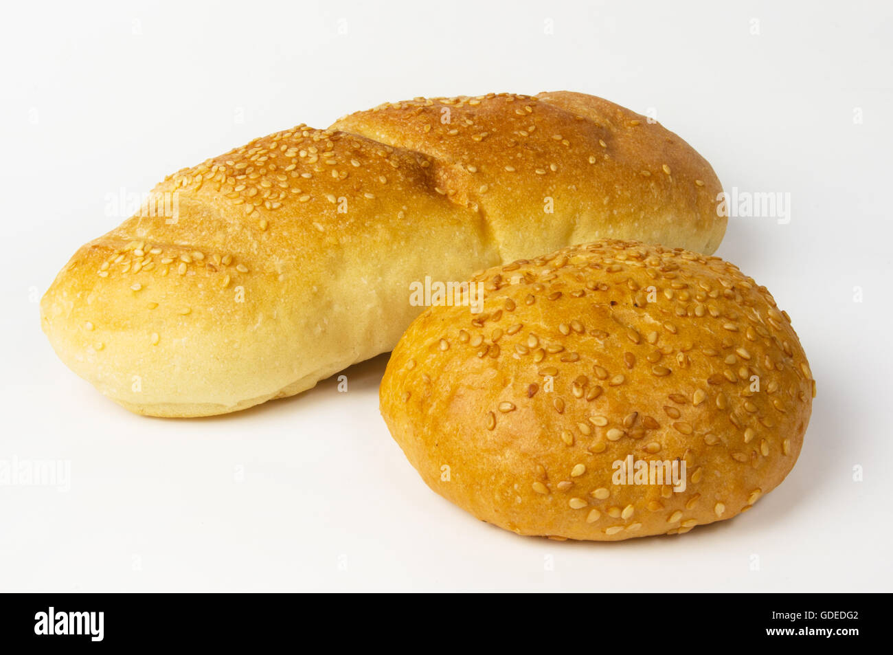 whole wheat bread and bun on white background Stock Photo - Alamy