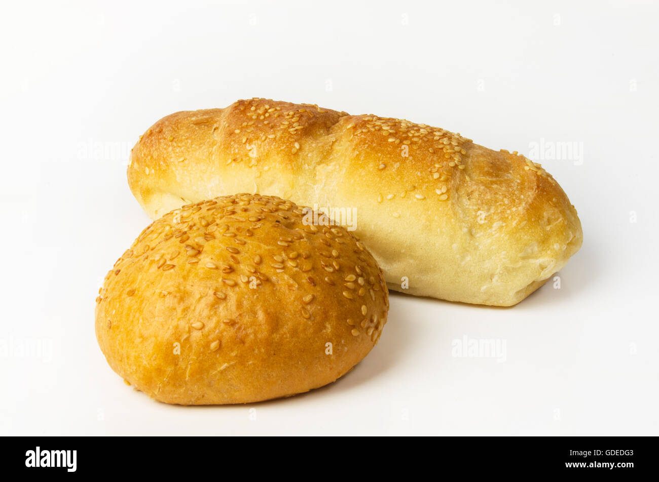 whole wheat bread and bun on white background Stock Photo - Alamy