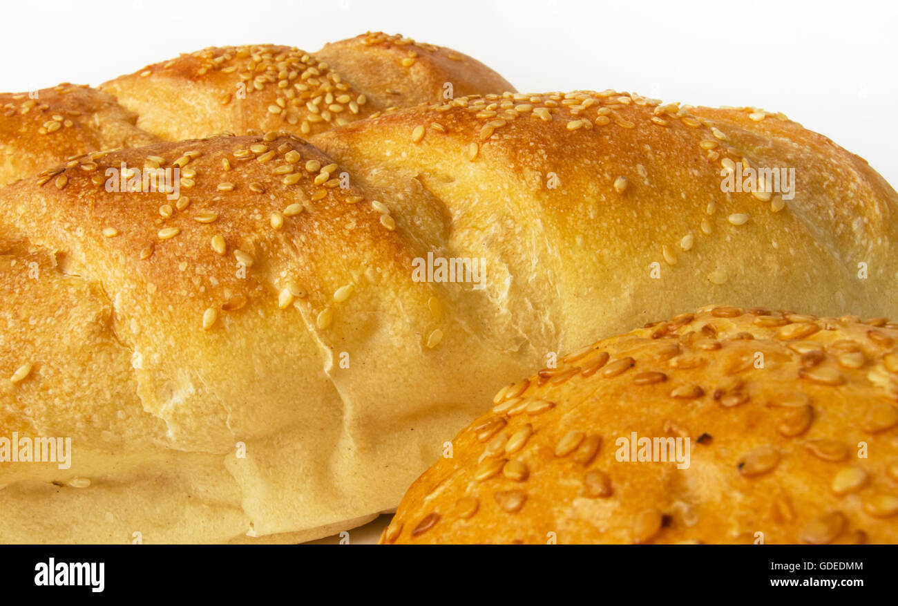 whole wheat two breads and bun on white background Stock Photo - Alamy