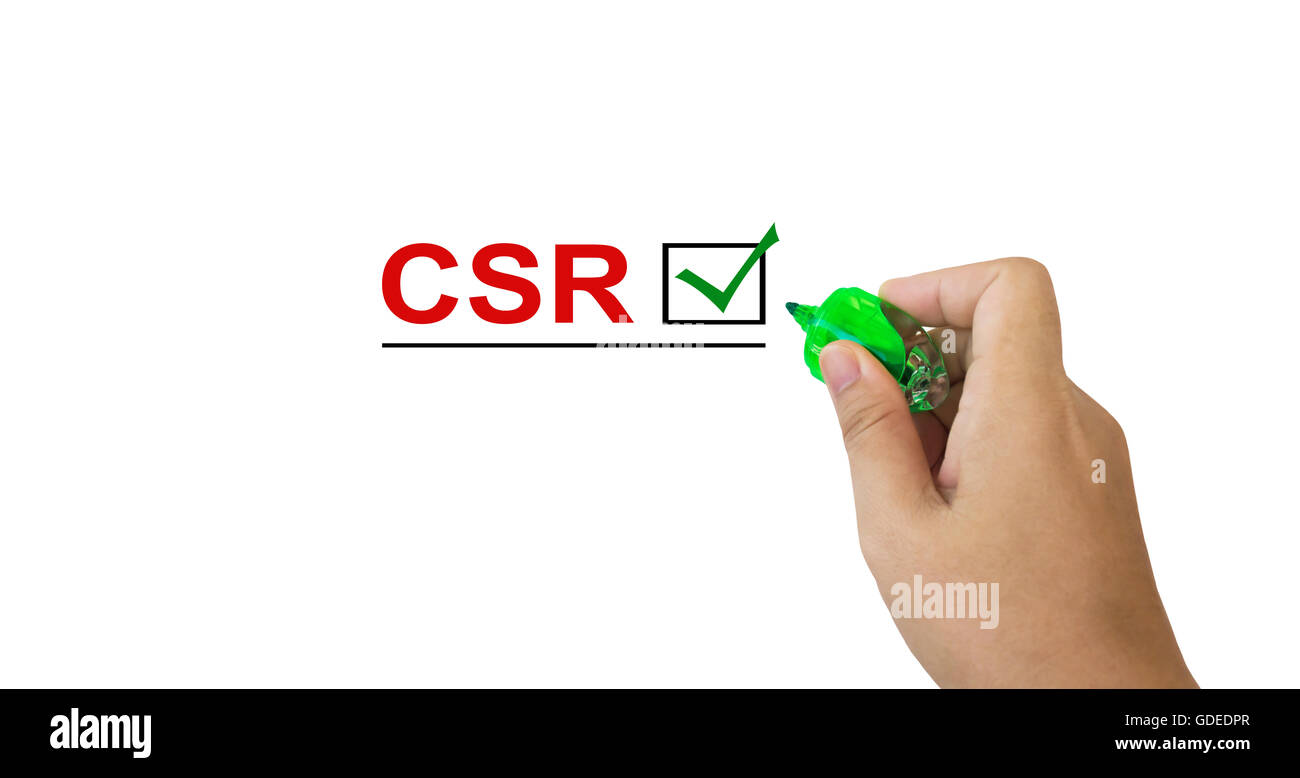 Text CSR in red colour with isolated hand and marker pen writing on ...