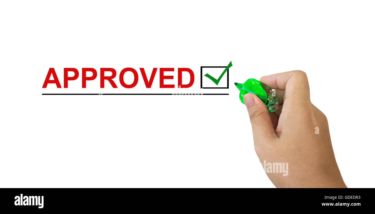 Text approved in red colour with isolated hand and marker pen writing ...