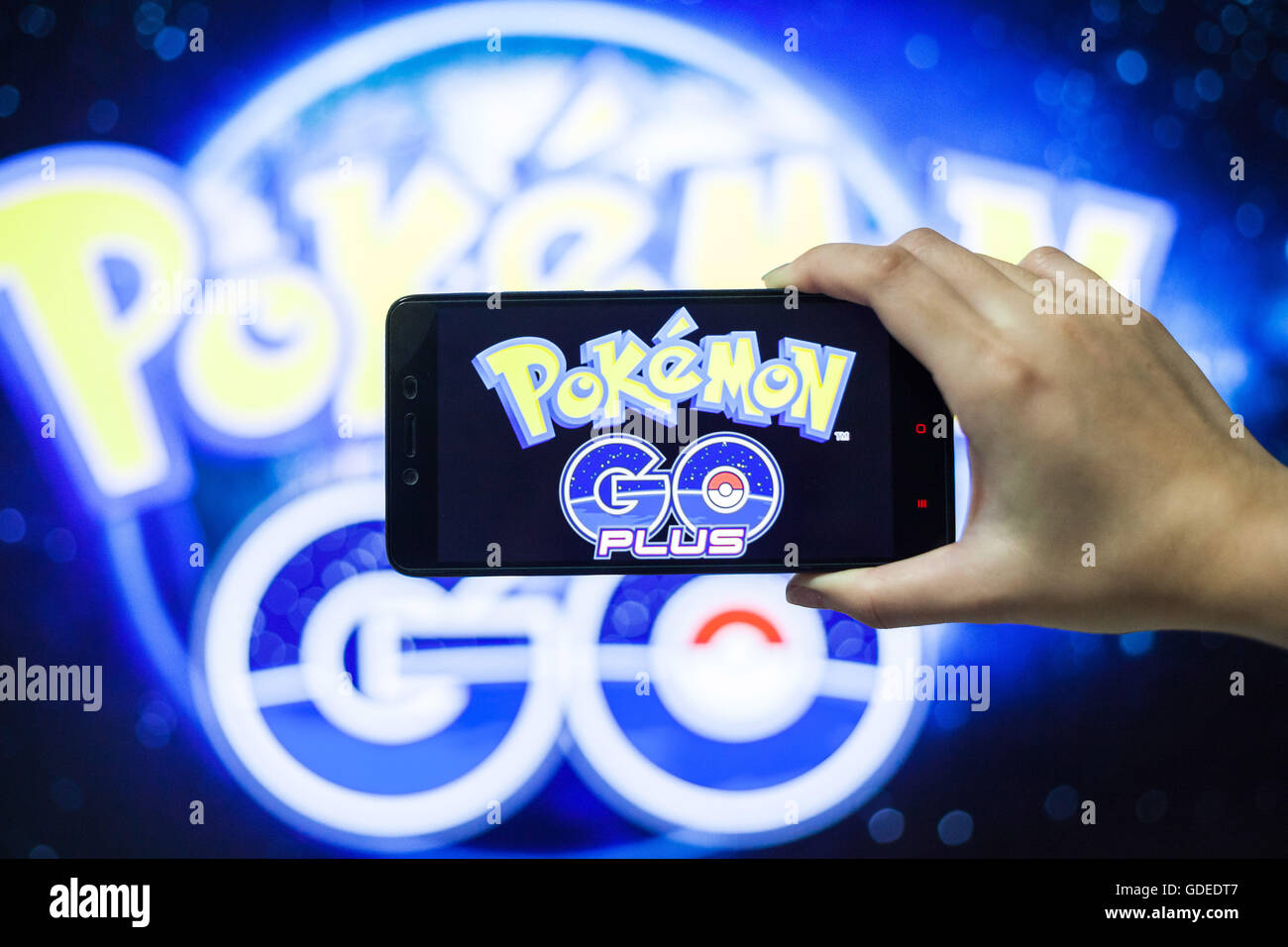 Pokemon Go game while with blur background Stock Photo - Alamy