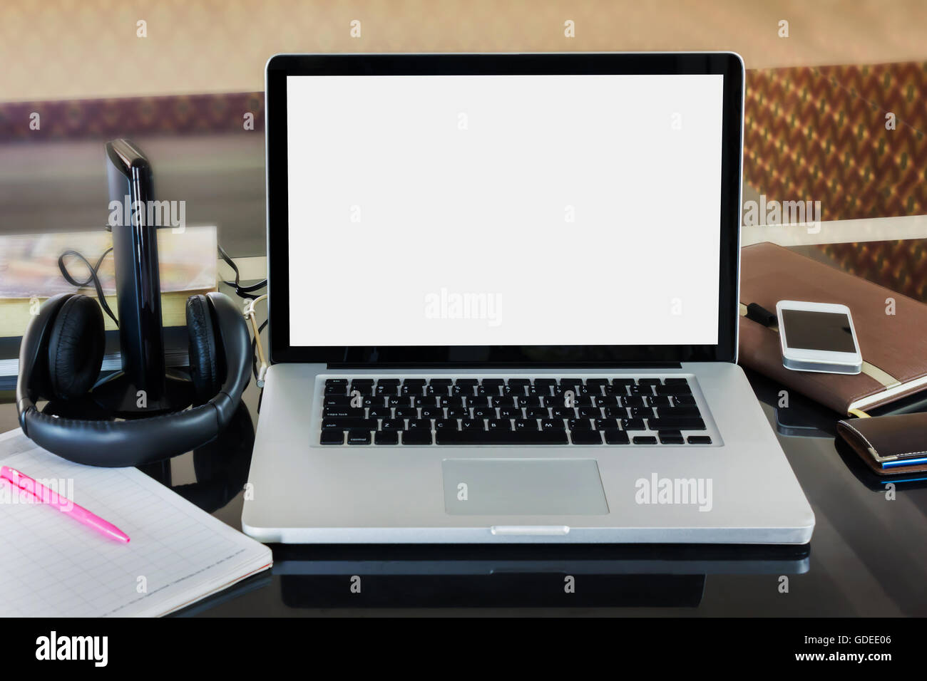 Blank screen notebook computer or laptop on working table, empty or ...