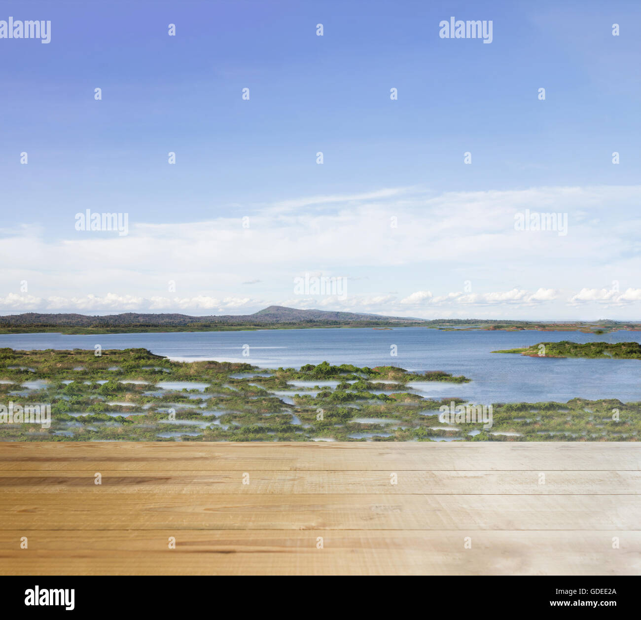 Jointed wood table top and lake or reservoir view with blank or space ...