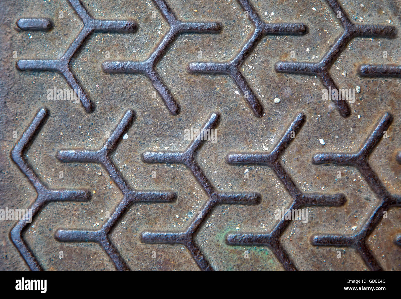 Texture of the metal manhole cover of street sewage shaft Stock Photo ...