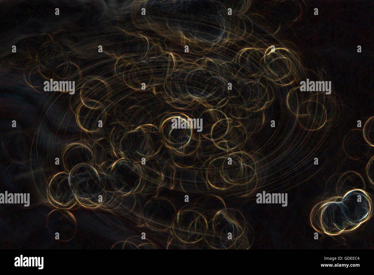 Abstract curve and round shape line spin to center on black background ...