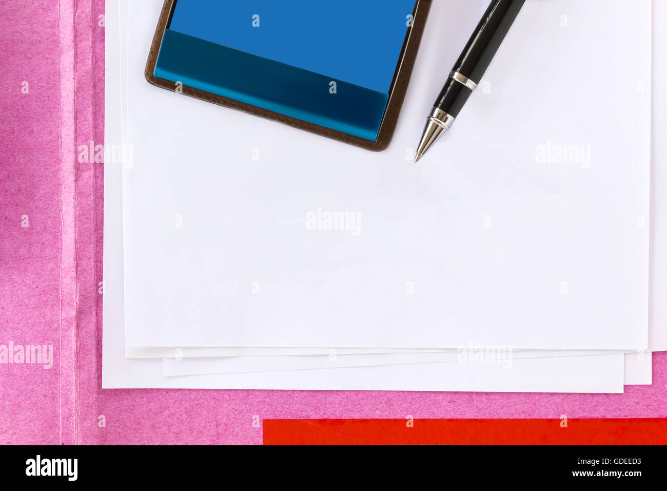 Pen and blank card and plain document paper on file folder with blank ...