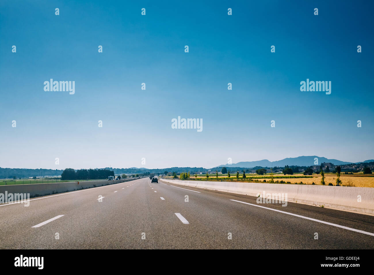 Beautiful asphalt road, freeway, motorway, highway under sunny blue ...