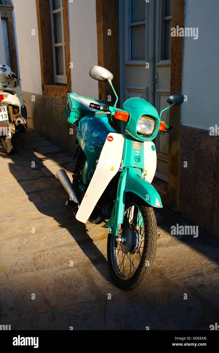 Turquoise Scooter in Greece Stock Photo - Alamy
