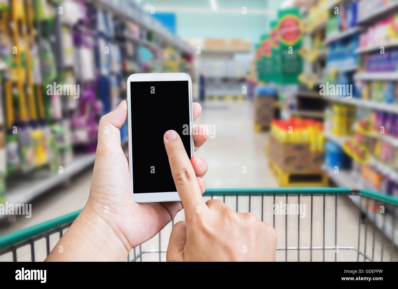 Hand press on big blank smartphone screen or mobile phone on shopping ...