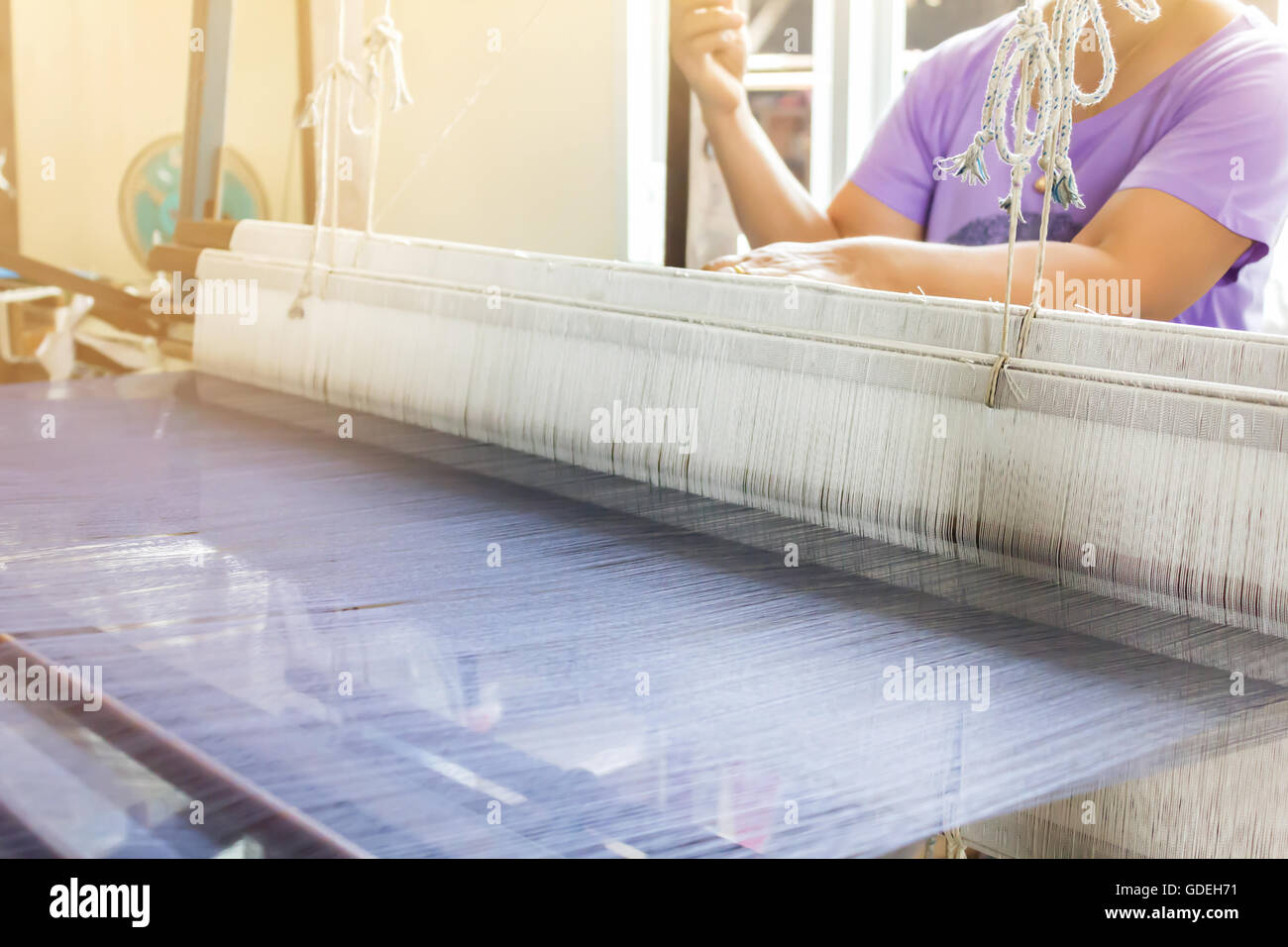 Silk domestic native weaving, handmade textile Stock Photo - Alamy