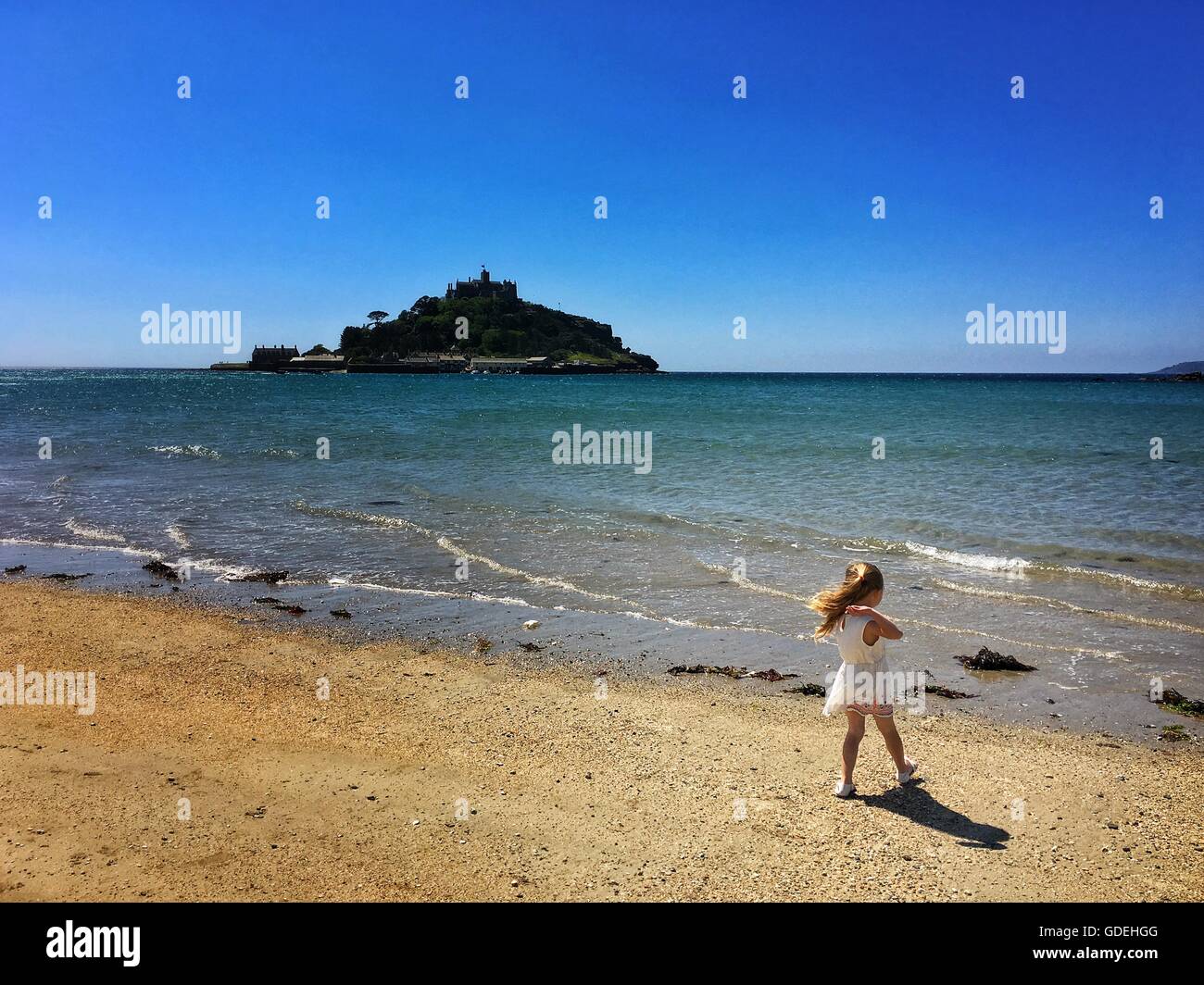 Children girl throwing rocks hi-res stock photography and images - Alamy