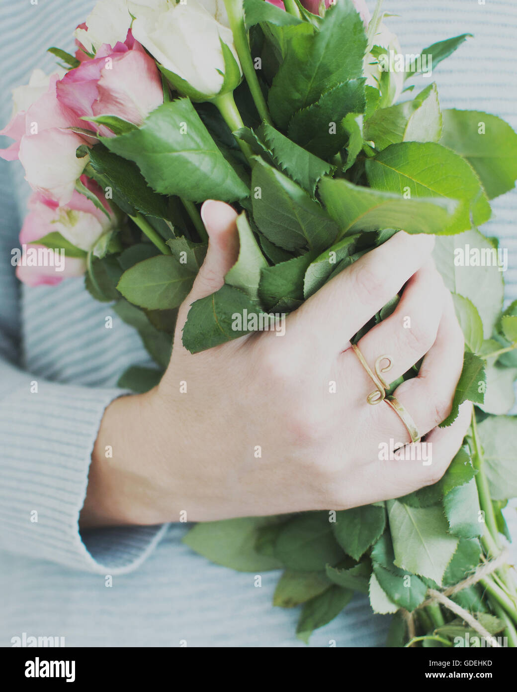 Holding roses flowers bouquet hi-res stock photography and images - Alamy